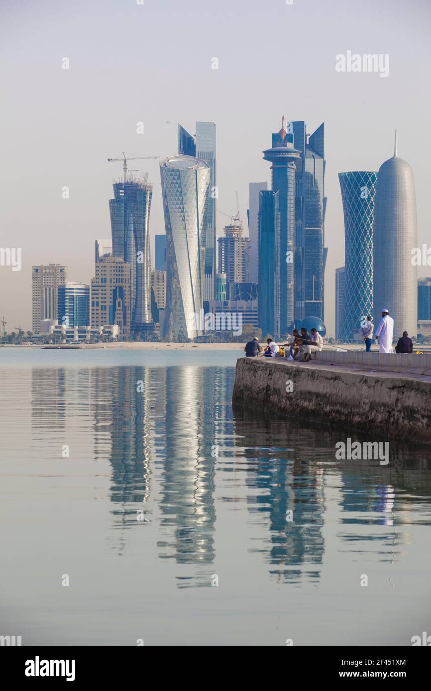Qatar, Doha, Men fishing on the Cornish Stock Photo - Alamy