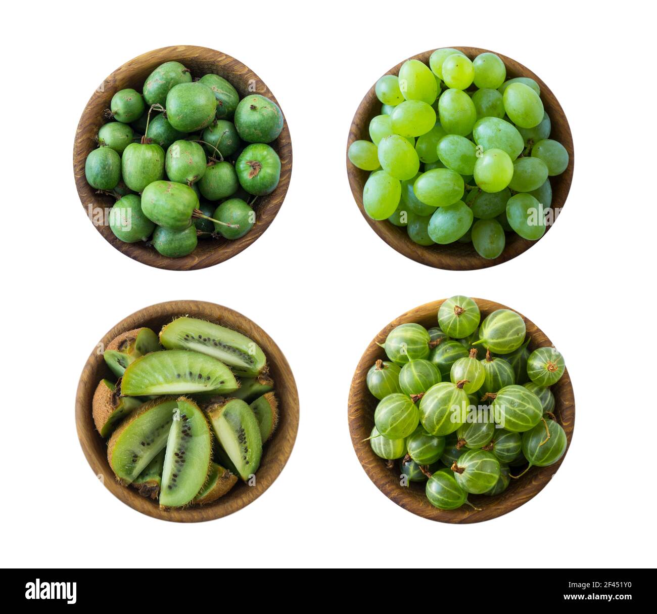 Green food isolated on a white background. Collage of different fruits ...