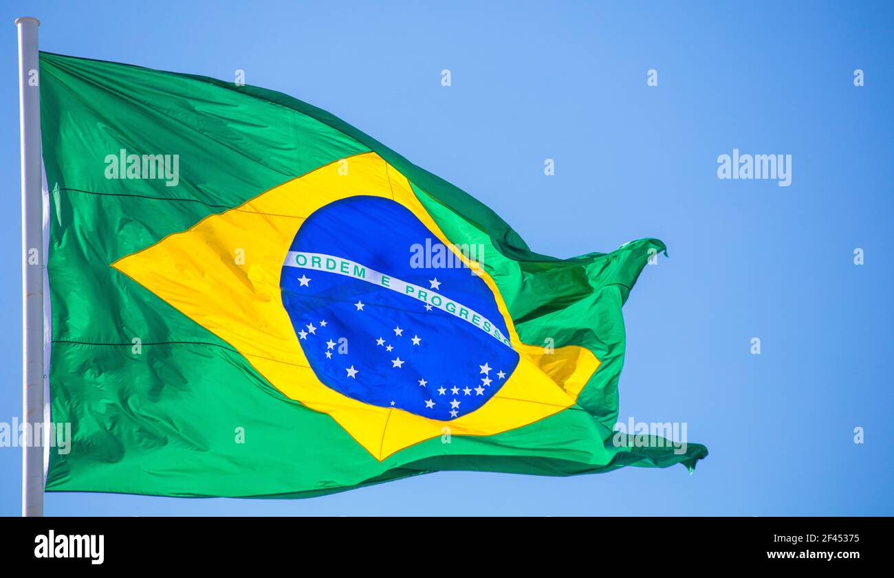 The Brazilian flag fluttering in the wind Stock Photo - Alamy