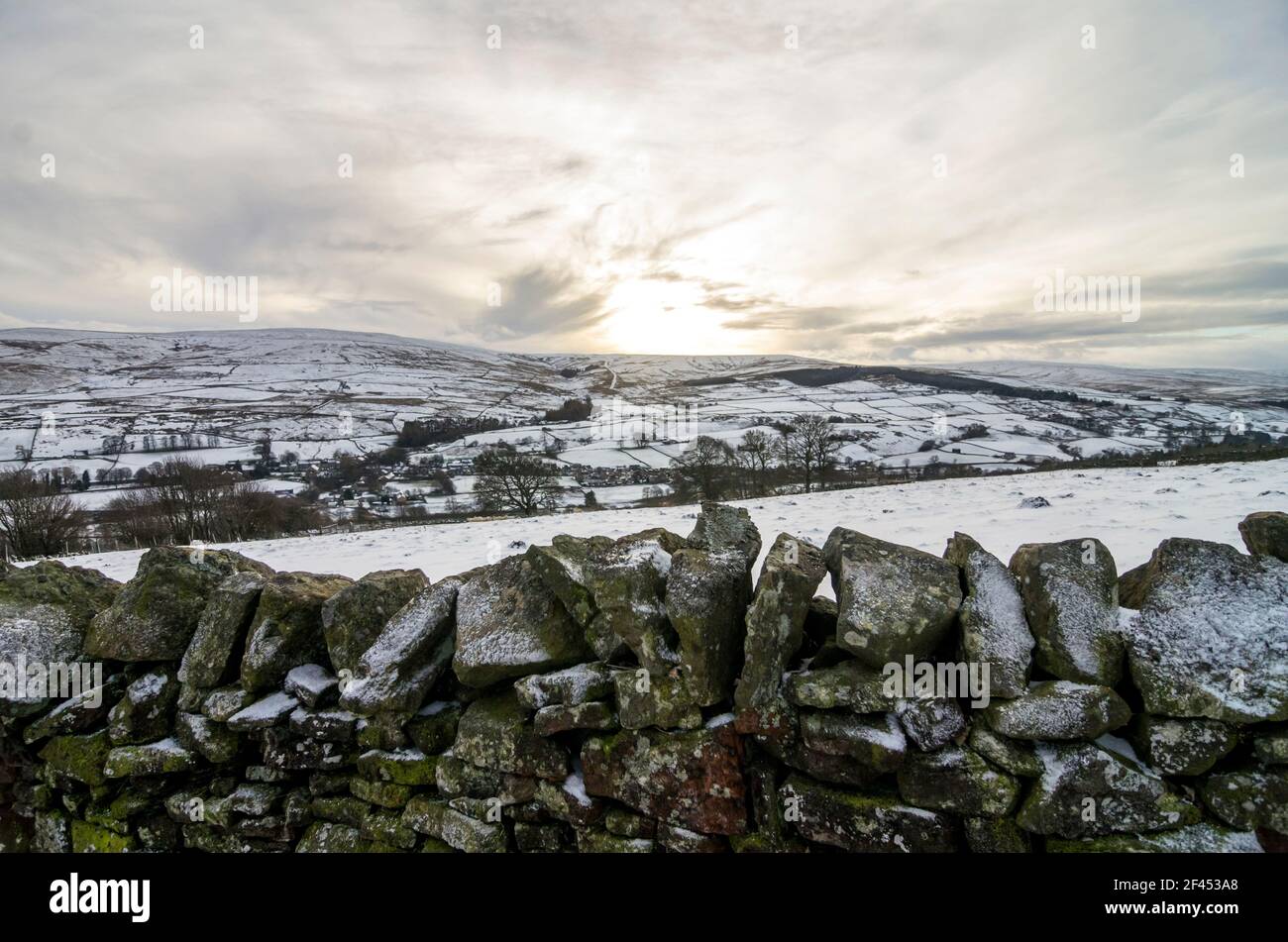 Snow covered landscape of hills and dry stone walls in Weardale, the ...