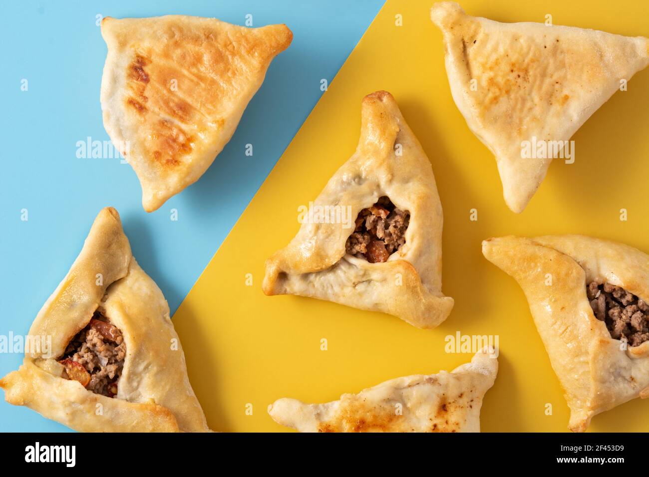 Traditional middle eastern fatayer on yellow and blue background Stock ...