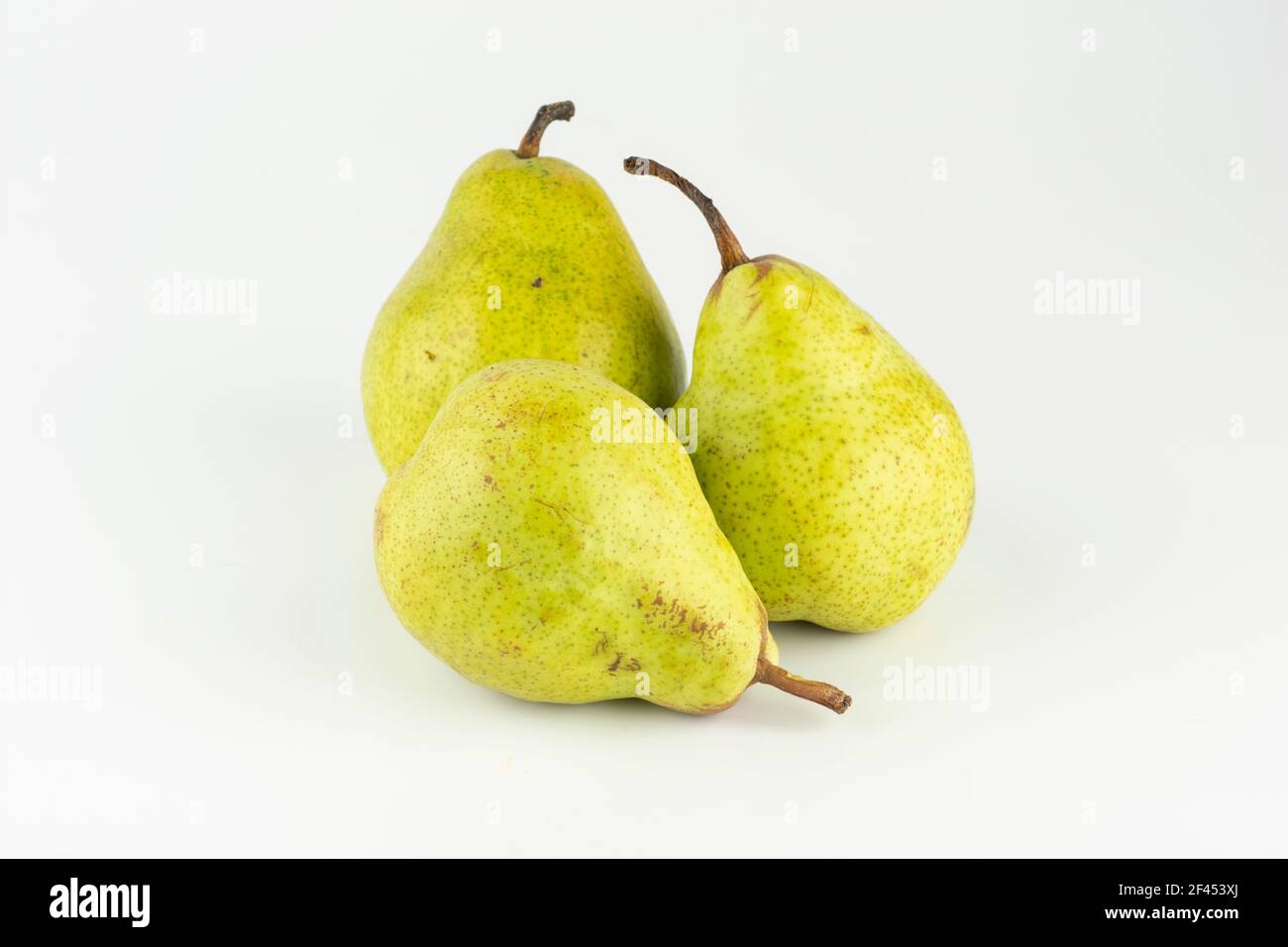 Group of pears over white background Stock Photo - Alamy