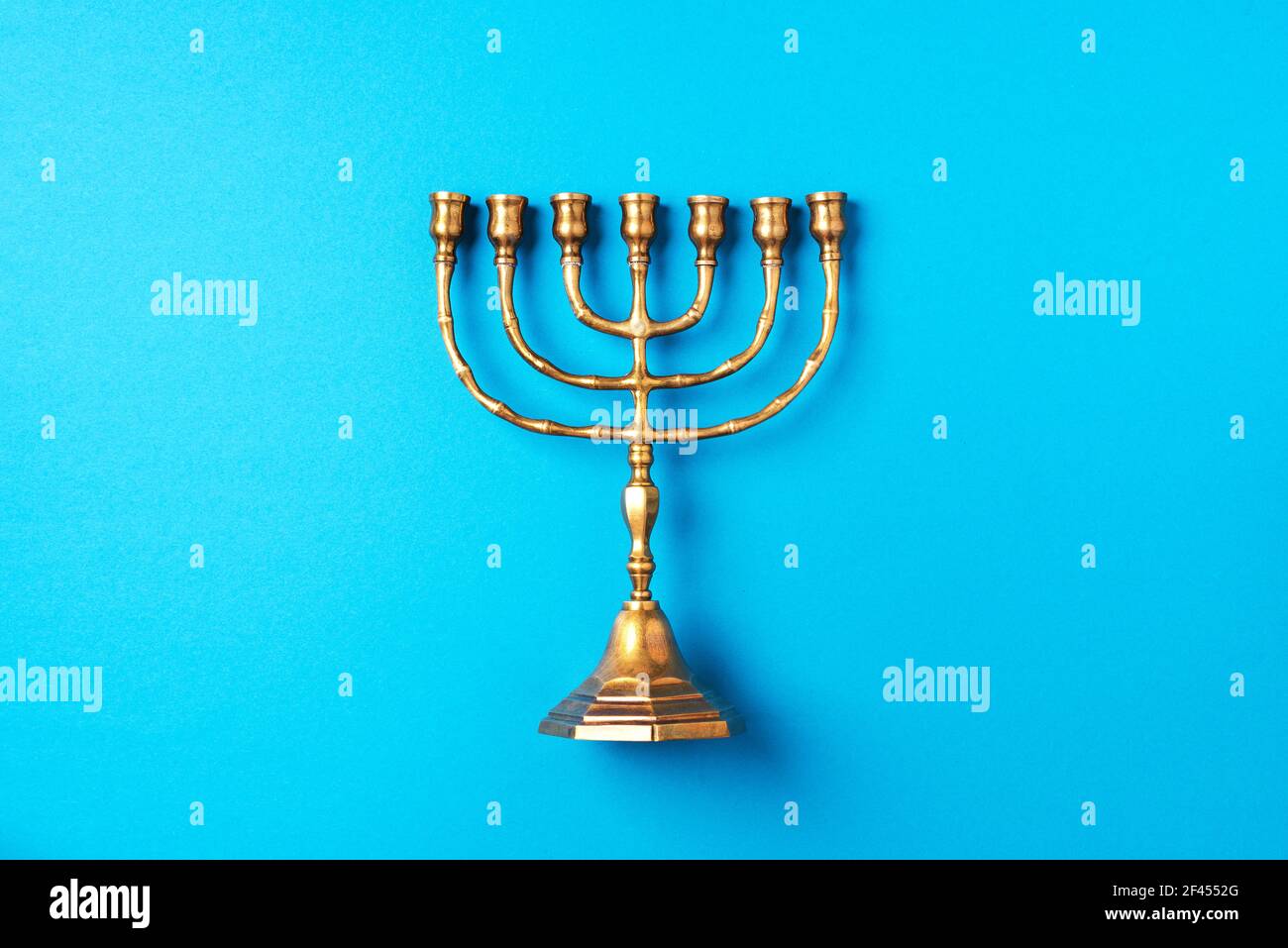 Golden hanukkah menorah on blue background. Jewish holiday banner with ...