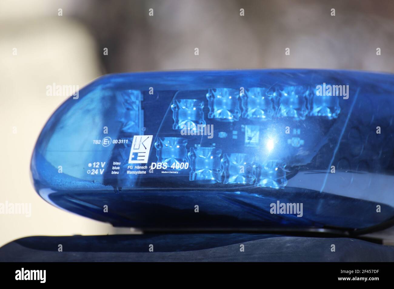 Symbol image police operation: Close up of a blue light on a police car ...