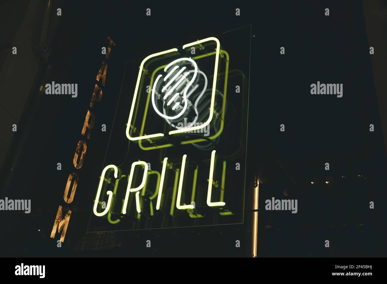 neon sign grill fast food city restaurant cafe yellow color Stock Photo ...