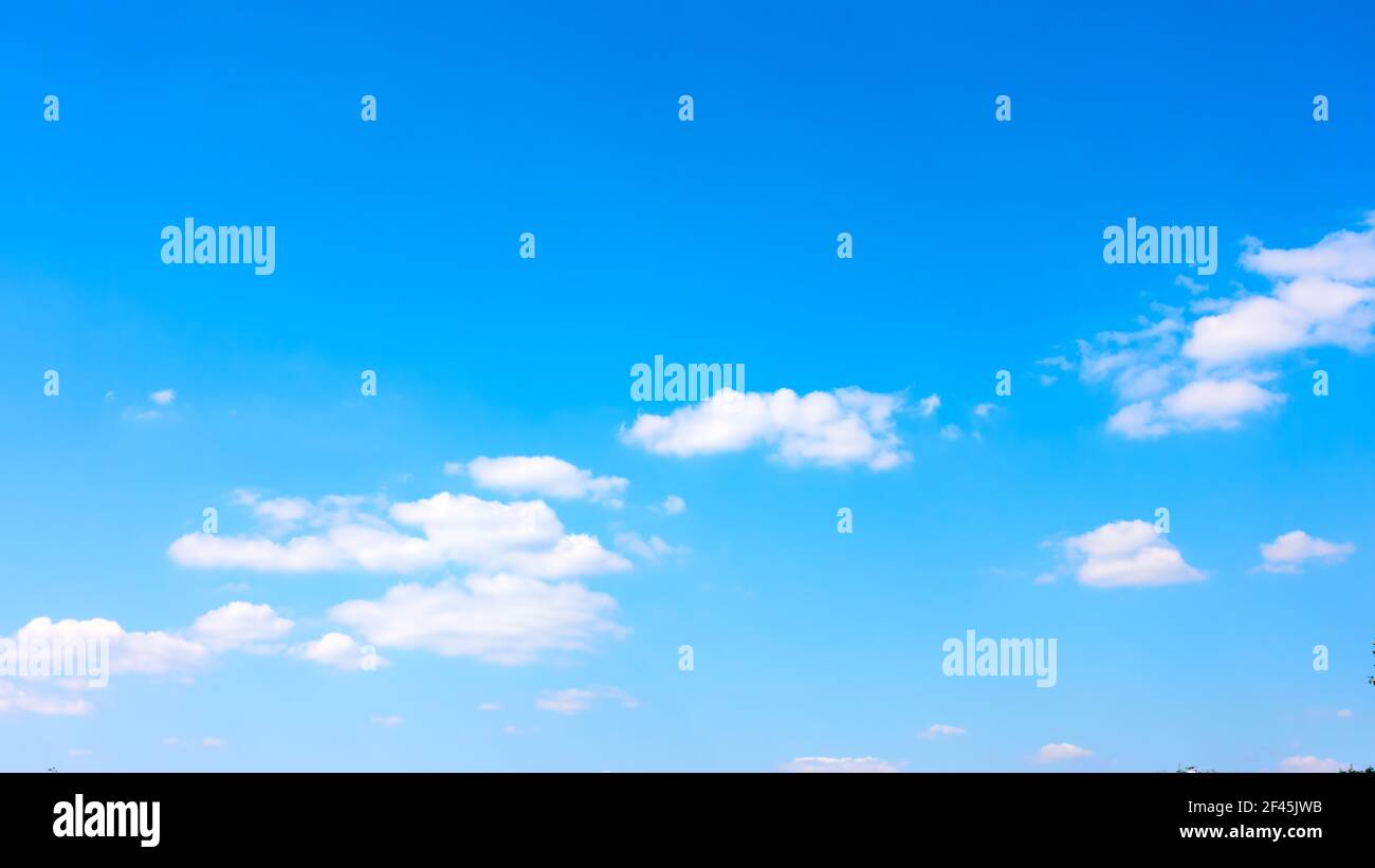 Blue spring sky with white clouds - panoramic cloudscape with space for ...
