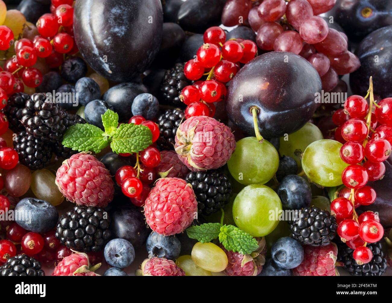 Background of fresh fruits and berries. Mix berries and fruits. Top ...