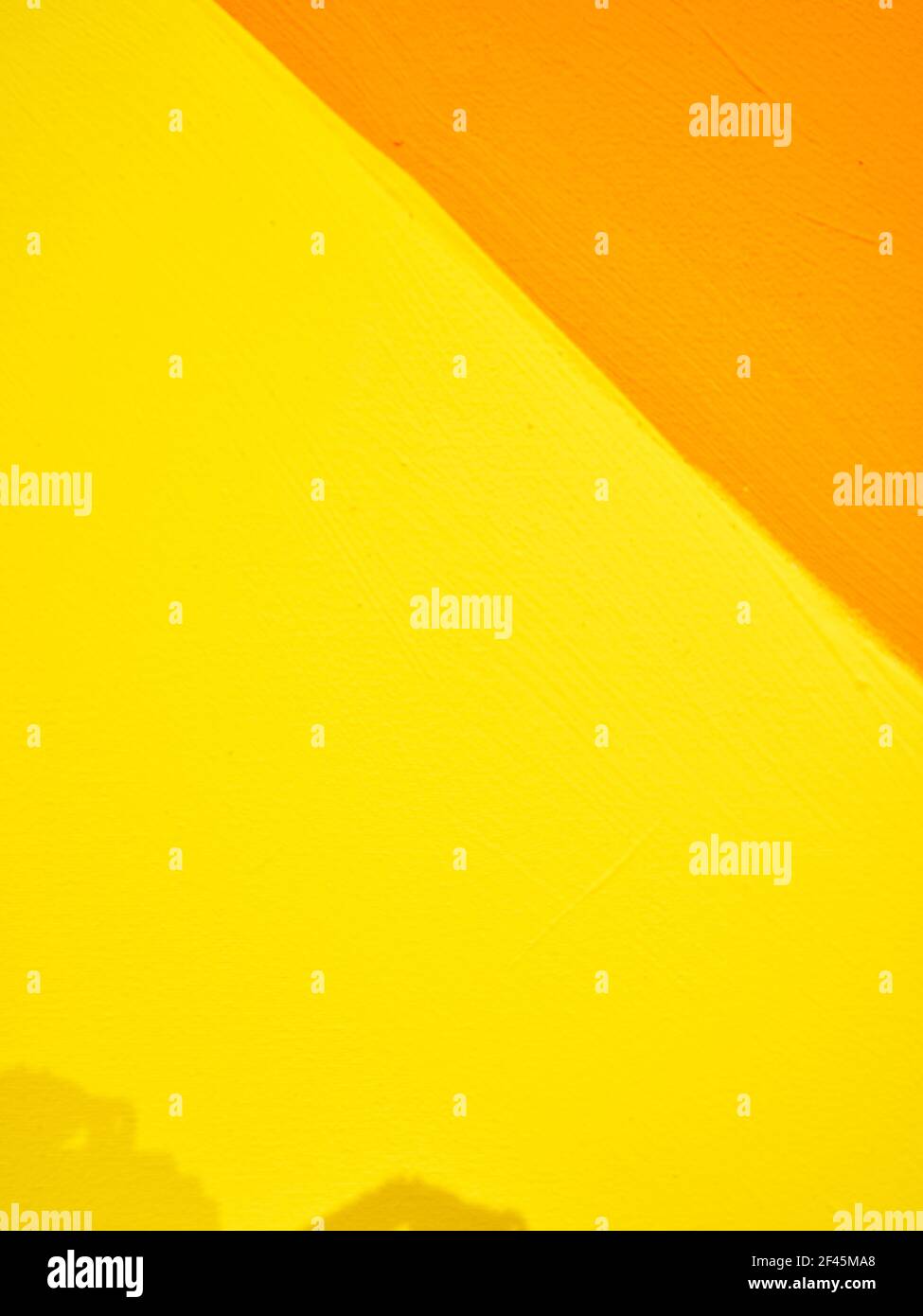 orange and yellow background color wall Stock Photo - Alamy