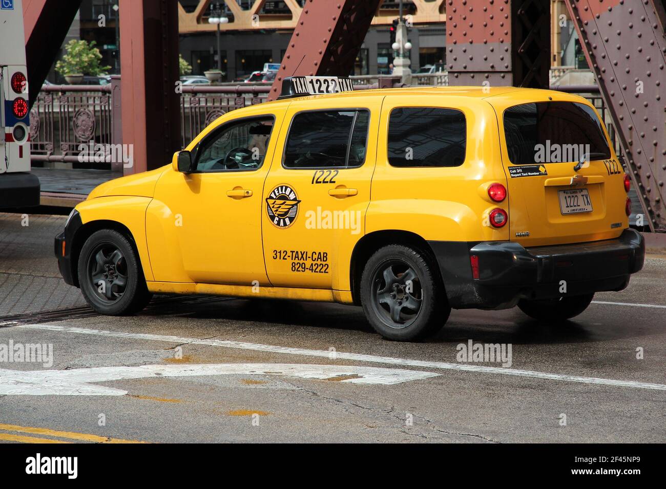 CHICAGO, USA - JUNE 26, 2013: Chevrolet HHR yellow taxi cab in central ...