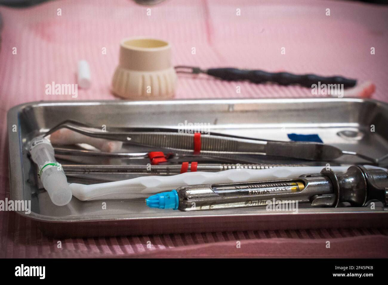 Different tools for dental treatment standing on dentists table Stock ...
