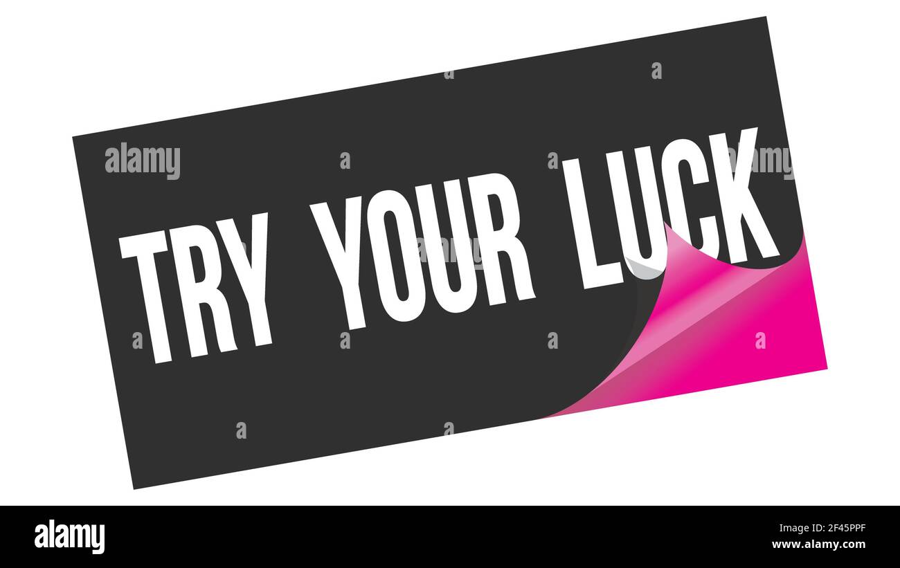 TRY YOUR LUCK text written on black pink sticker stamp Stock Photo - Alamy