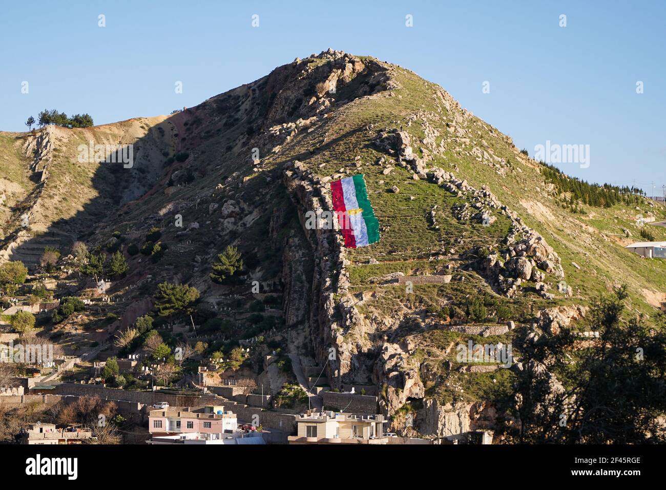 View of a Kurdish flag placed on one of the mountains in the Old town ...