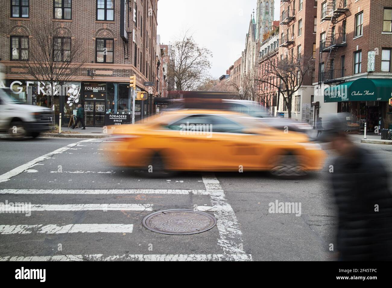 fast moving yellow taxi in new york city Stock Photo - Alamy