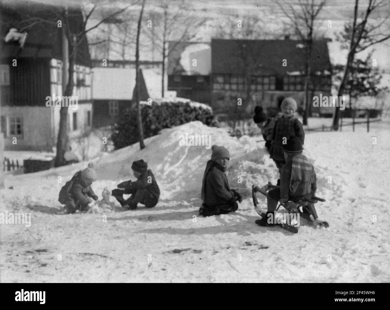 Children playing in residential Black and White Stock Photos & Images ...