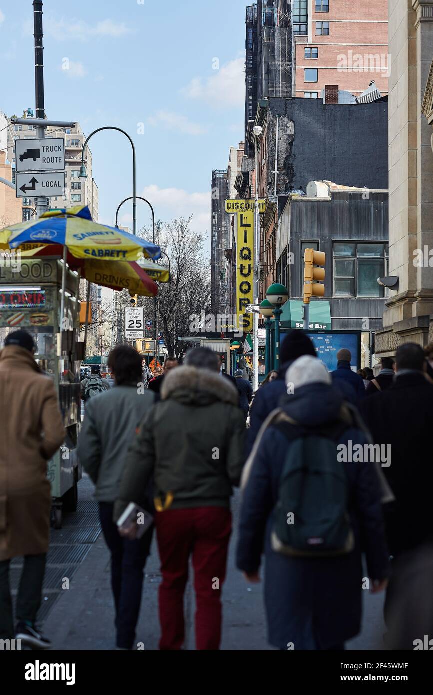 a very busy street with people walking to work Stock Photo - Alamy