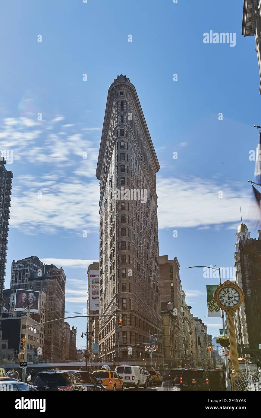 a triangle building in new york city with blue sky Stock Photo - Alamy