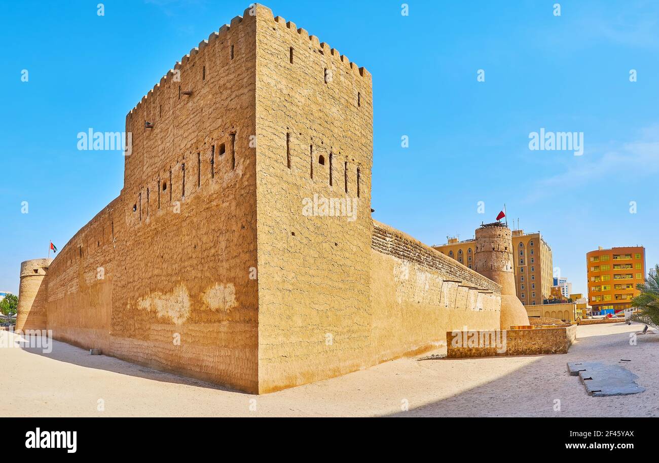 Panorama of Al Fahidi Fort with outer wall, covered with clay and tall ...