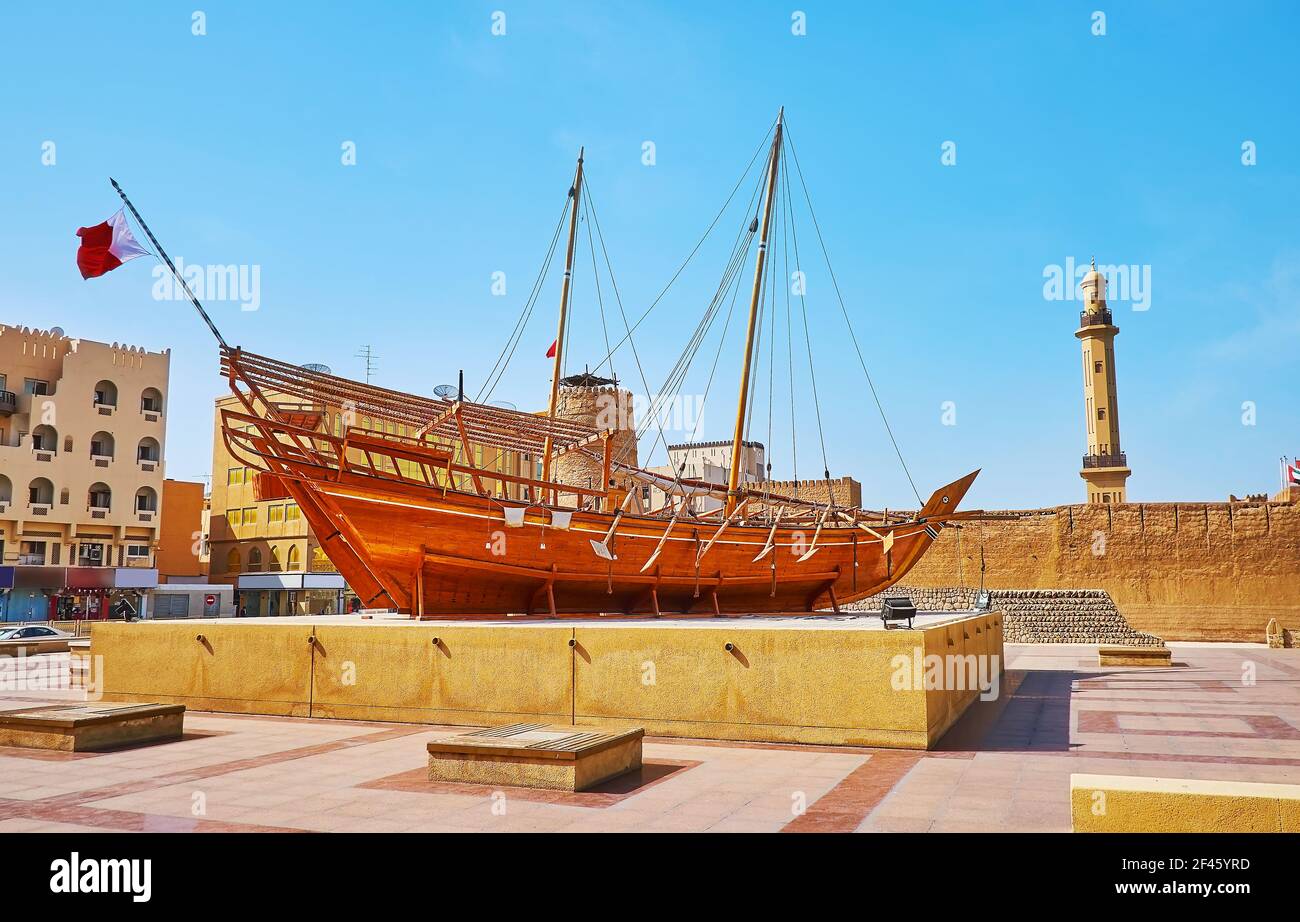 Historic Al Fahidi neighborhood of the city with the wooden dhow boat ...