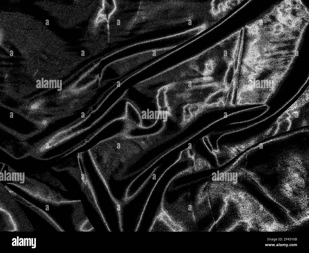 Black cloth or fabric texture background with liquid wave or wavy folds ...