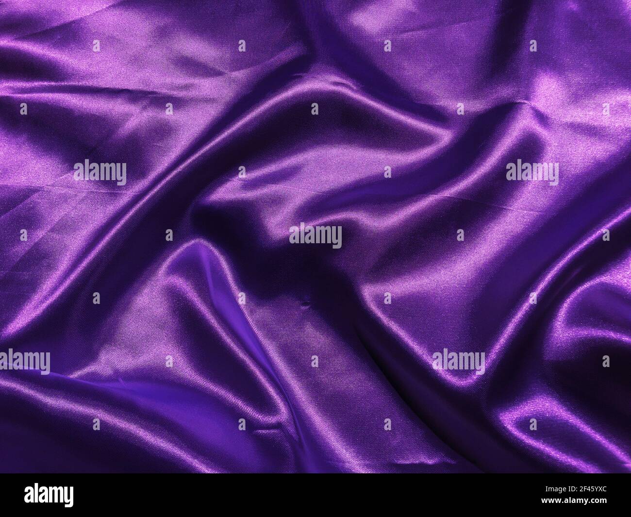 Beautiful smooth purple fabric texture background with copy space for ...