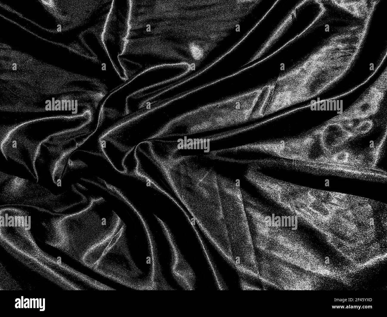 Black cloth or fabric texture background with liquid wave or wavy folds ...