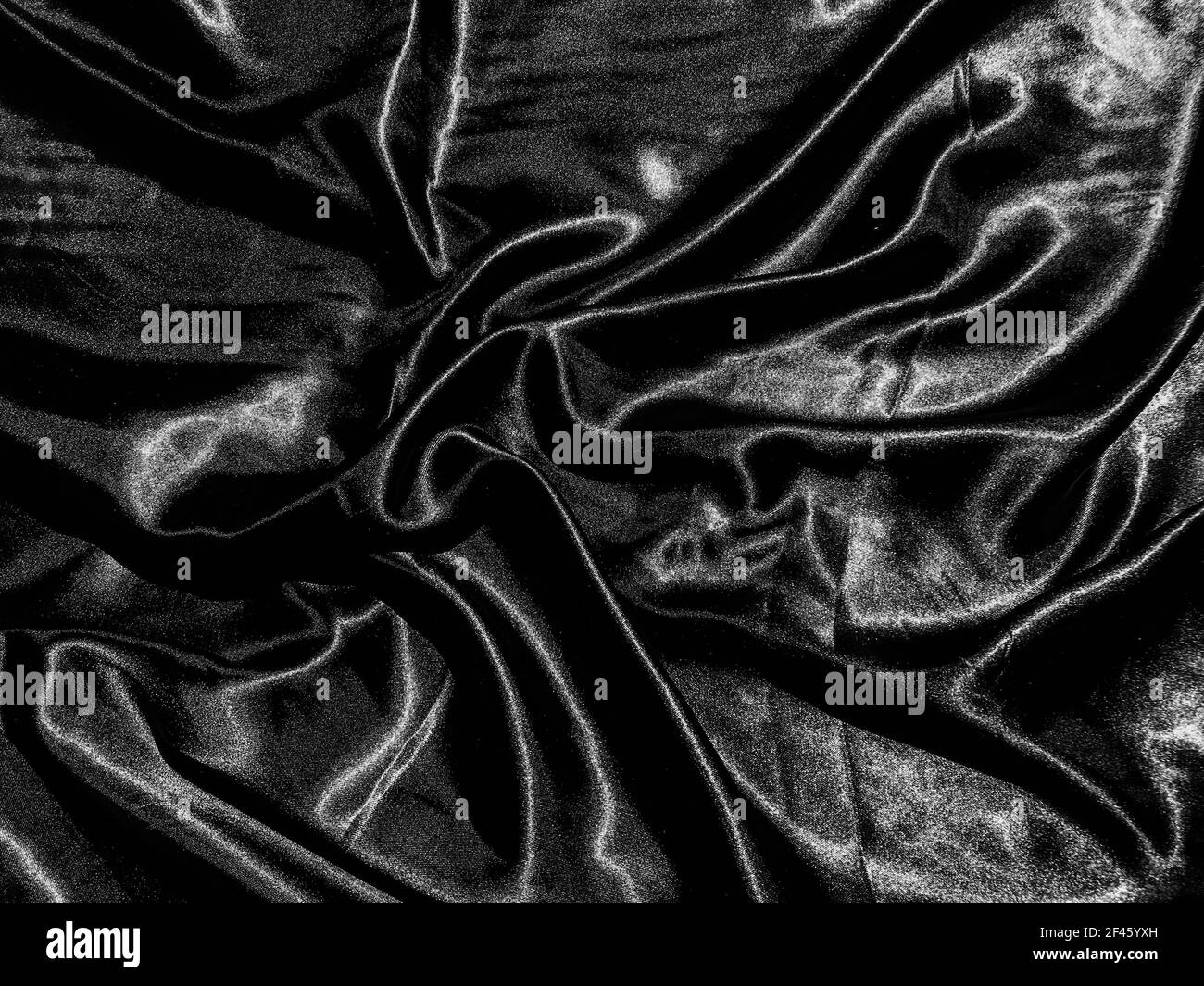 Black cloth or fabric texture background with liquid wave or wavy folds ...