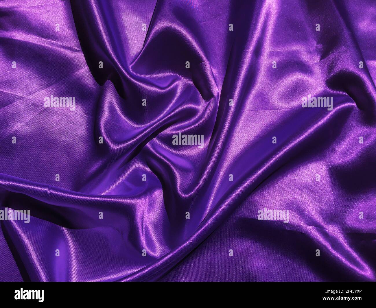 Beautiful smooth purple fabric texture background with copy space for ...