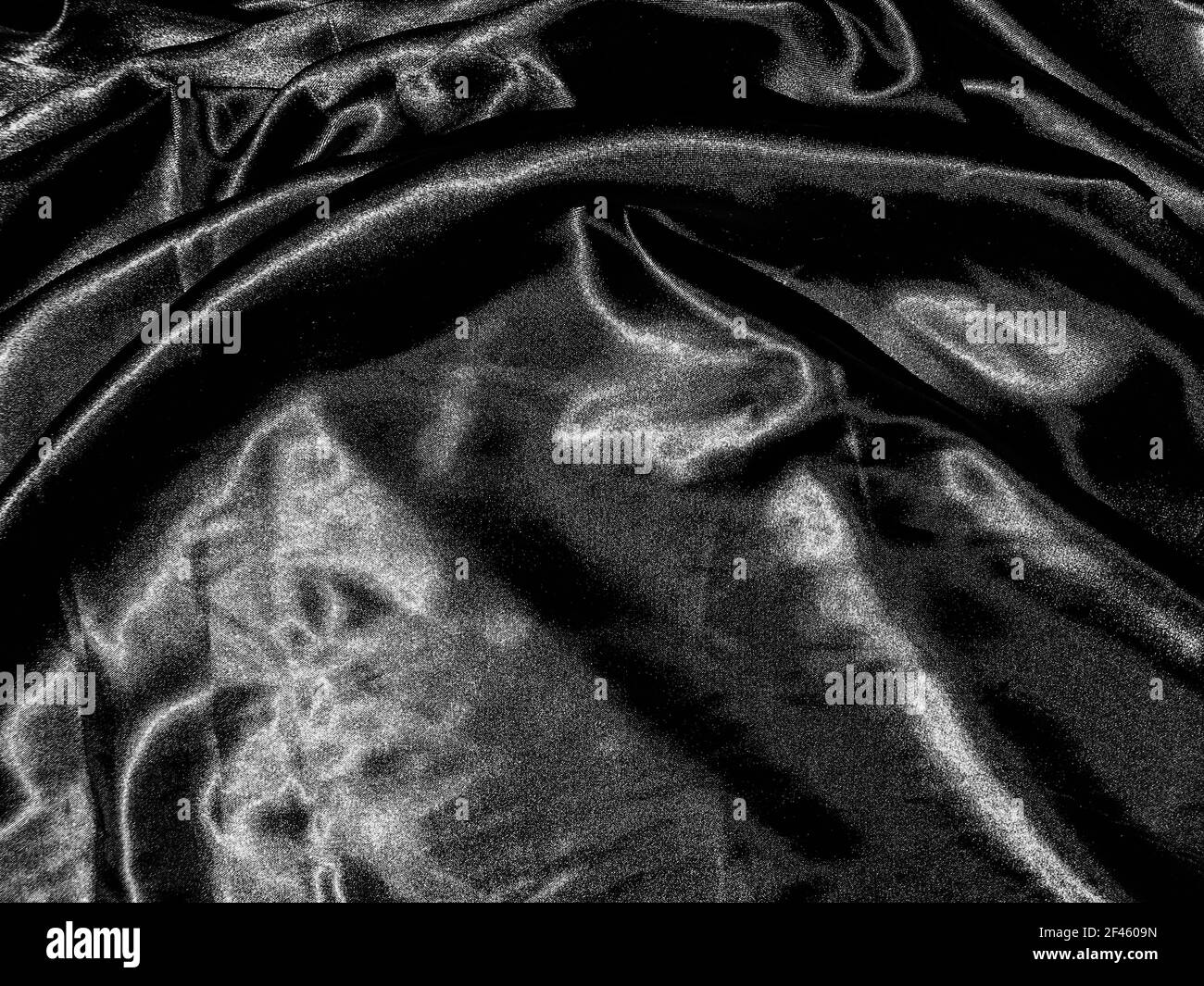 Black cloth or fabric texture background with liquid wave or wavy folds ...