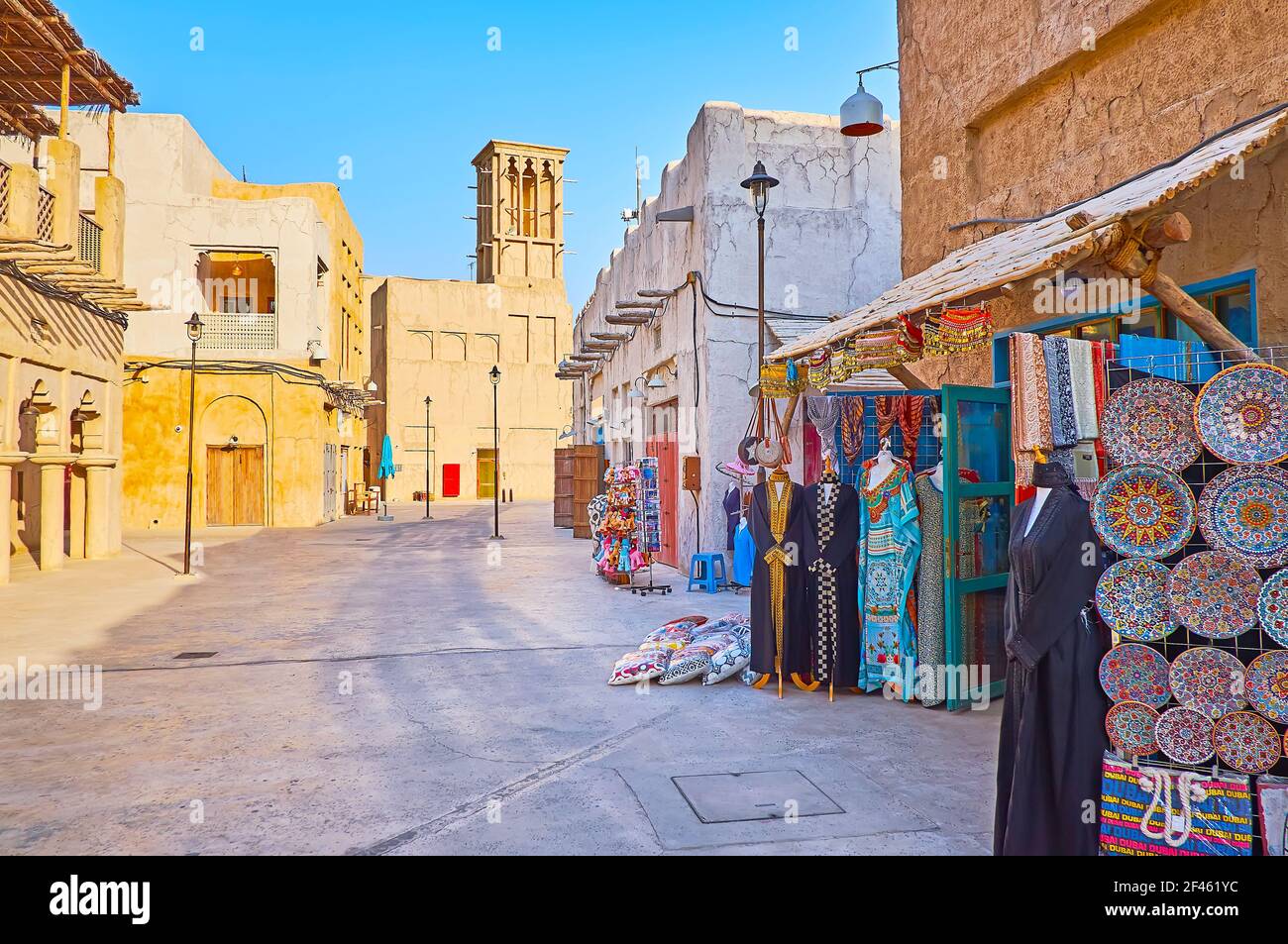 The colorful pottery and traditional Islamic clothes in the market ...