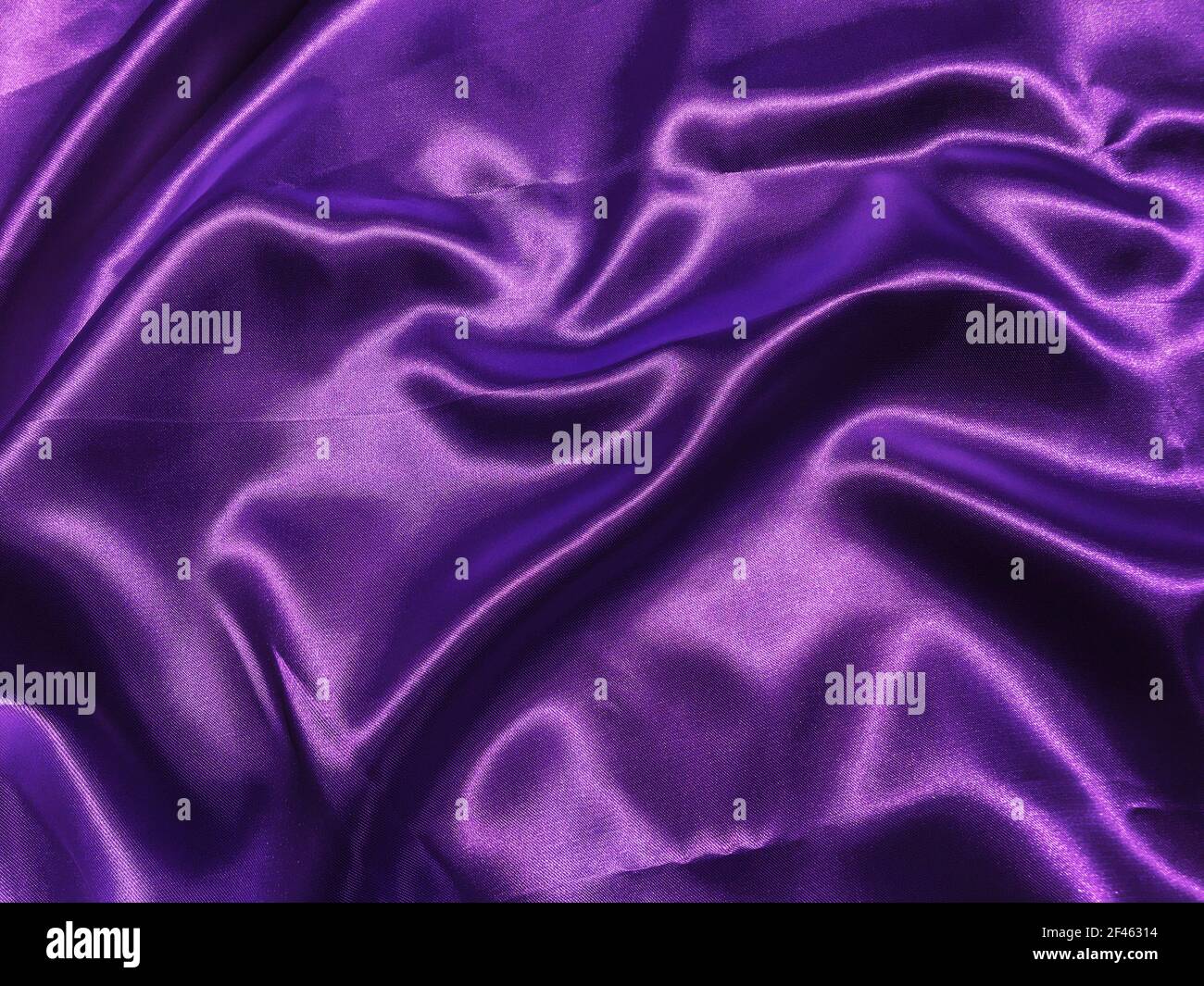 Smooth purple fabric or satin texture background with copy space for ...