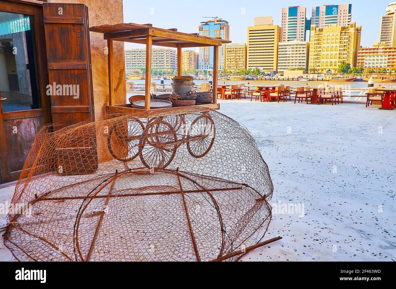 The outdoor fish restaurant in Al Fahidi with a vintage gargoor fish ...