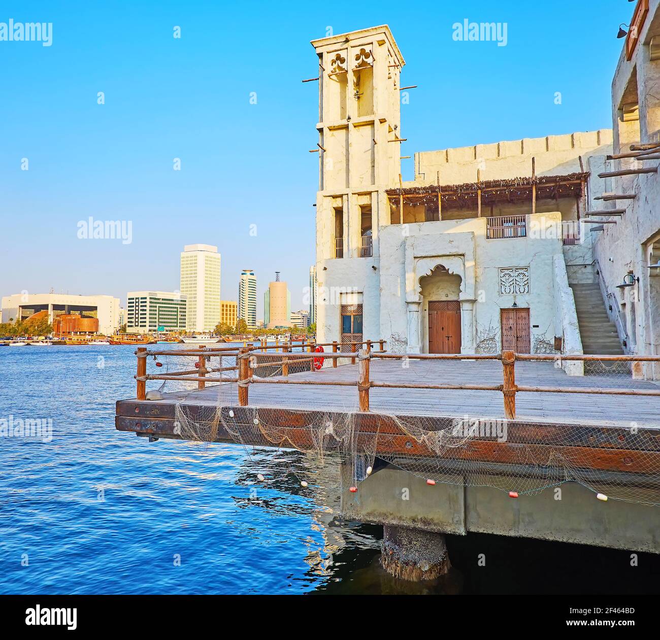 The creekside walk with a view on historic housing of Al Fahidi and ...