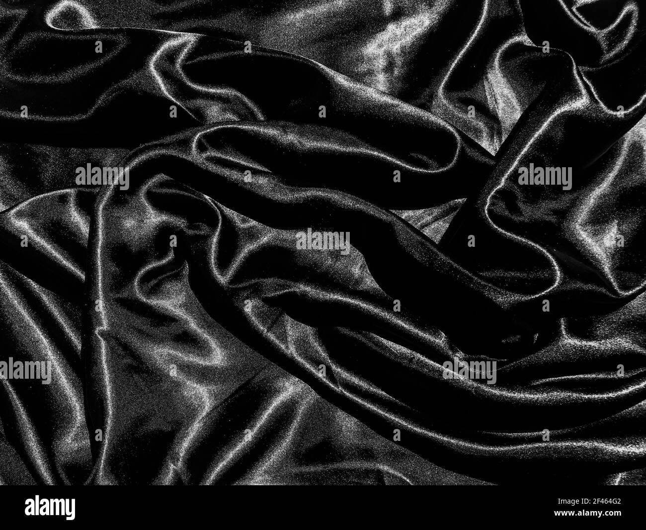 Black satin texture background with liquid wave or wavy folds ...