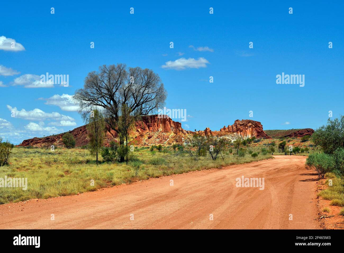 Australia, unsealed road to rock formation in Rainbow valley national ...