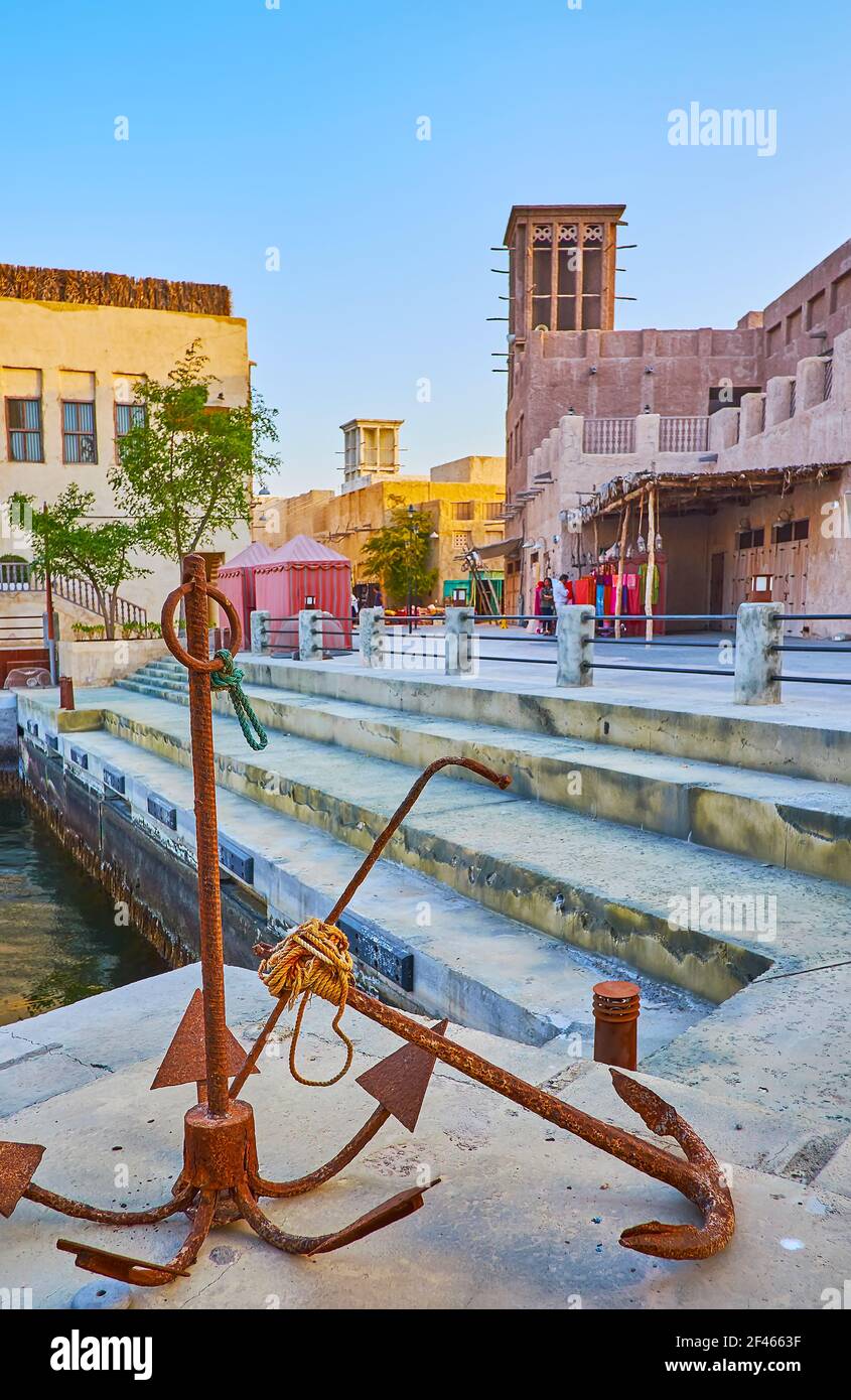 The old rusty anchors serve like an installation on the bank of Dubai ...