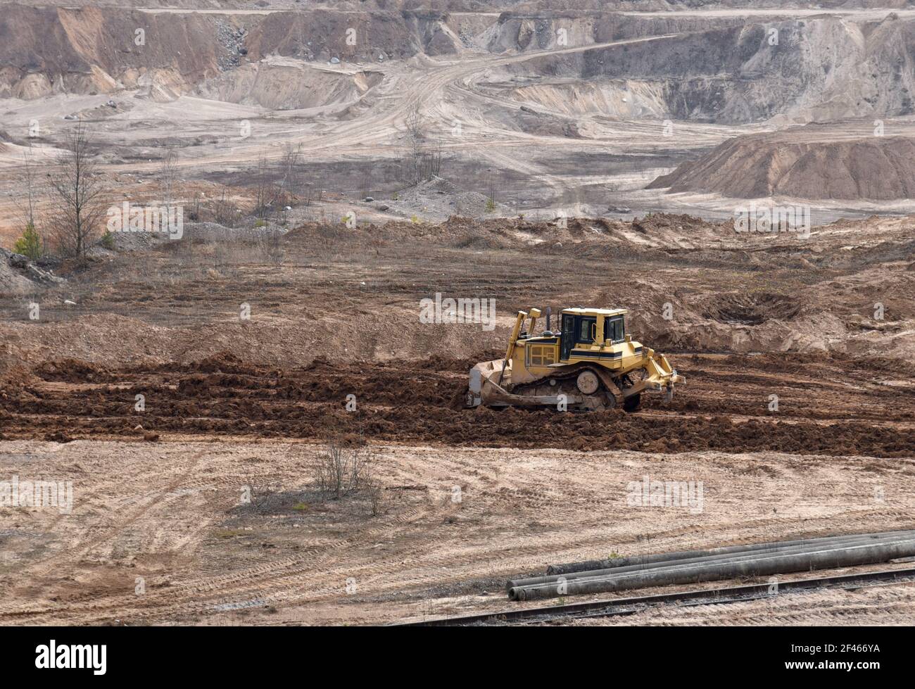 Dozer has been recovering the landscape around the open pit. Process of ...