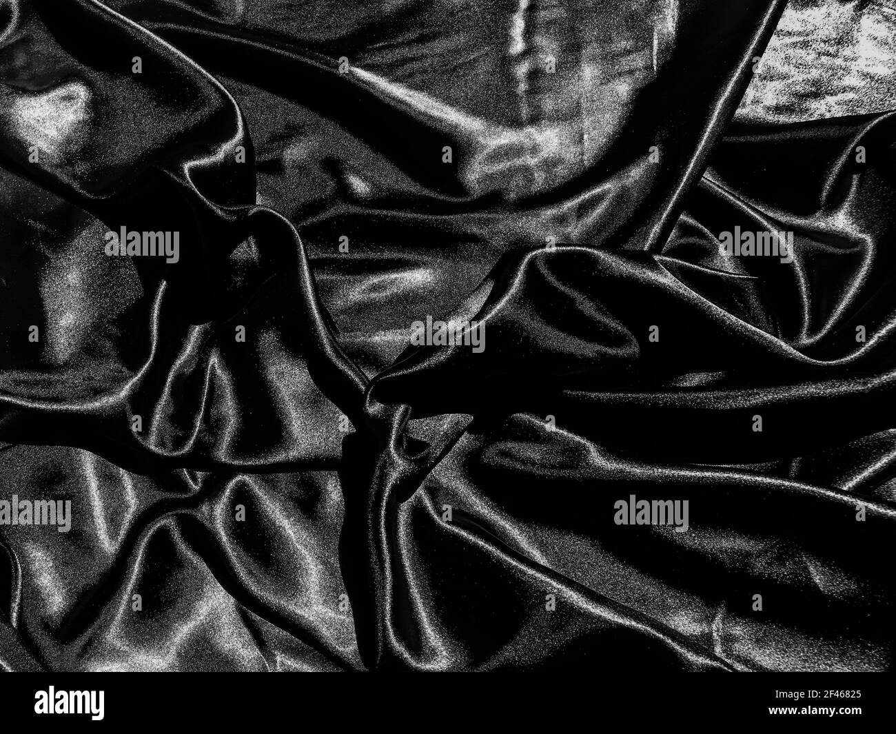 Black satin texture background with liquid wave or wavy folds ...