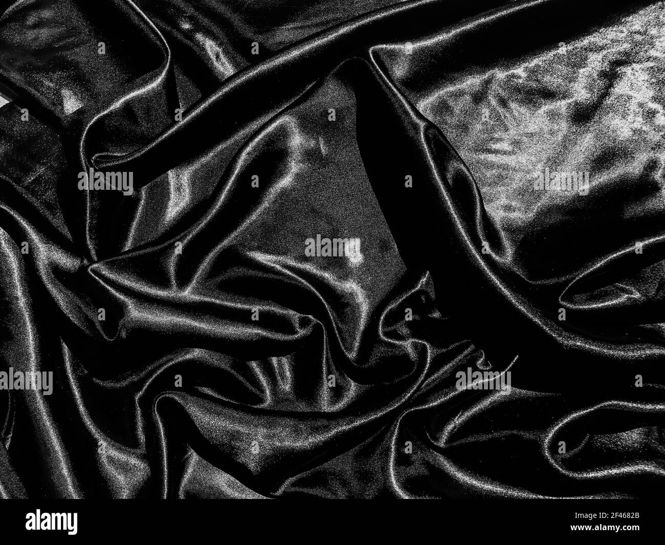 Black satin texture background with liquid wave or wavy folds ...