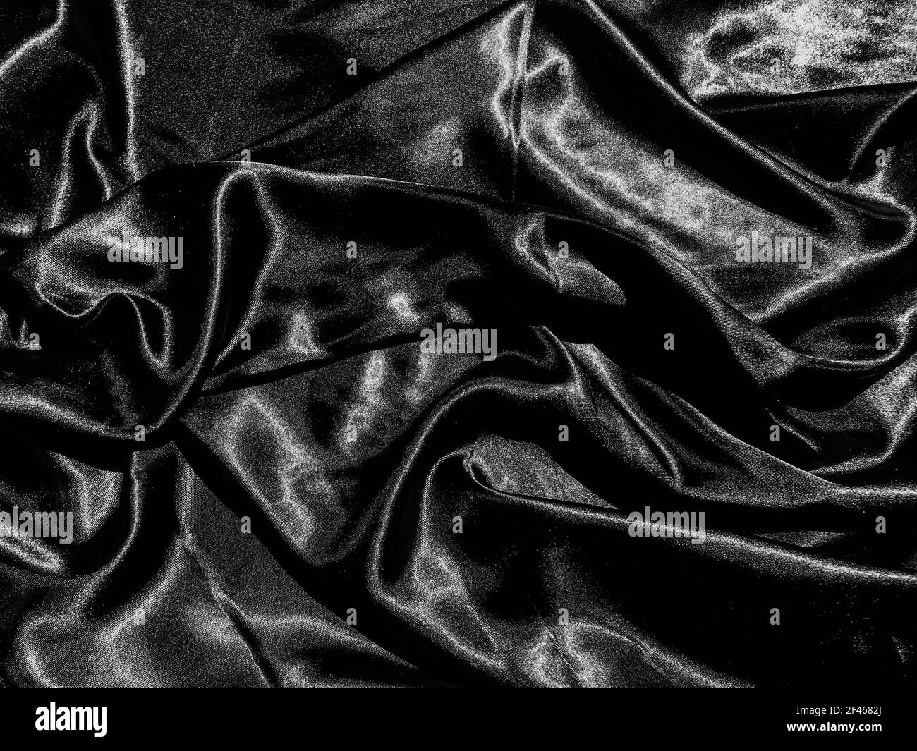 Black satin texture background with liquid wave or wavy folds ...