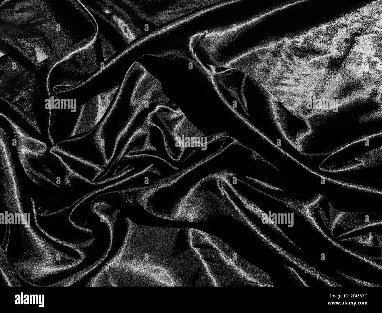 Black satin texture background with liquid wave or wavy folds ...