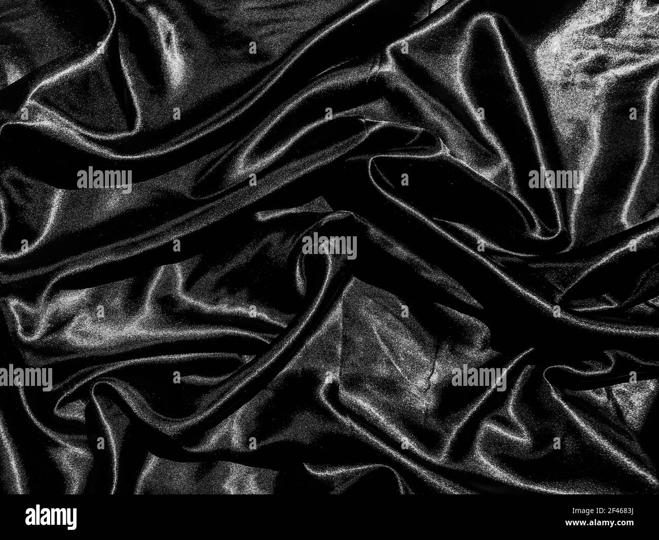 Black satin texture background with liquid wave or wavy folds ...