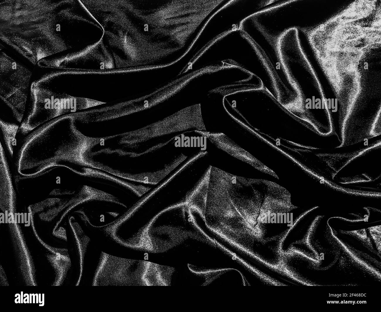 Black satin texture background with liquid wave or wavy folds ...