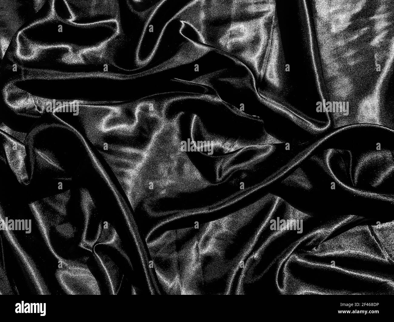 Black satin texture background with liquid wave or wavy folds ...