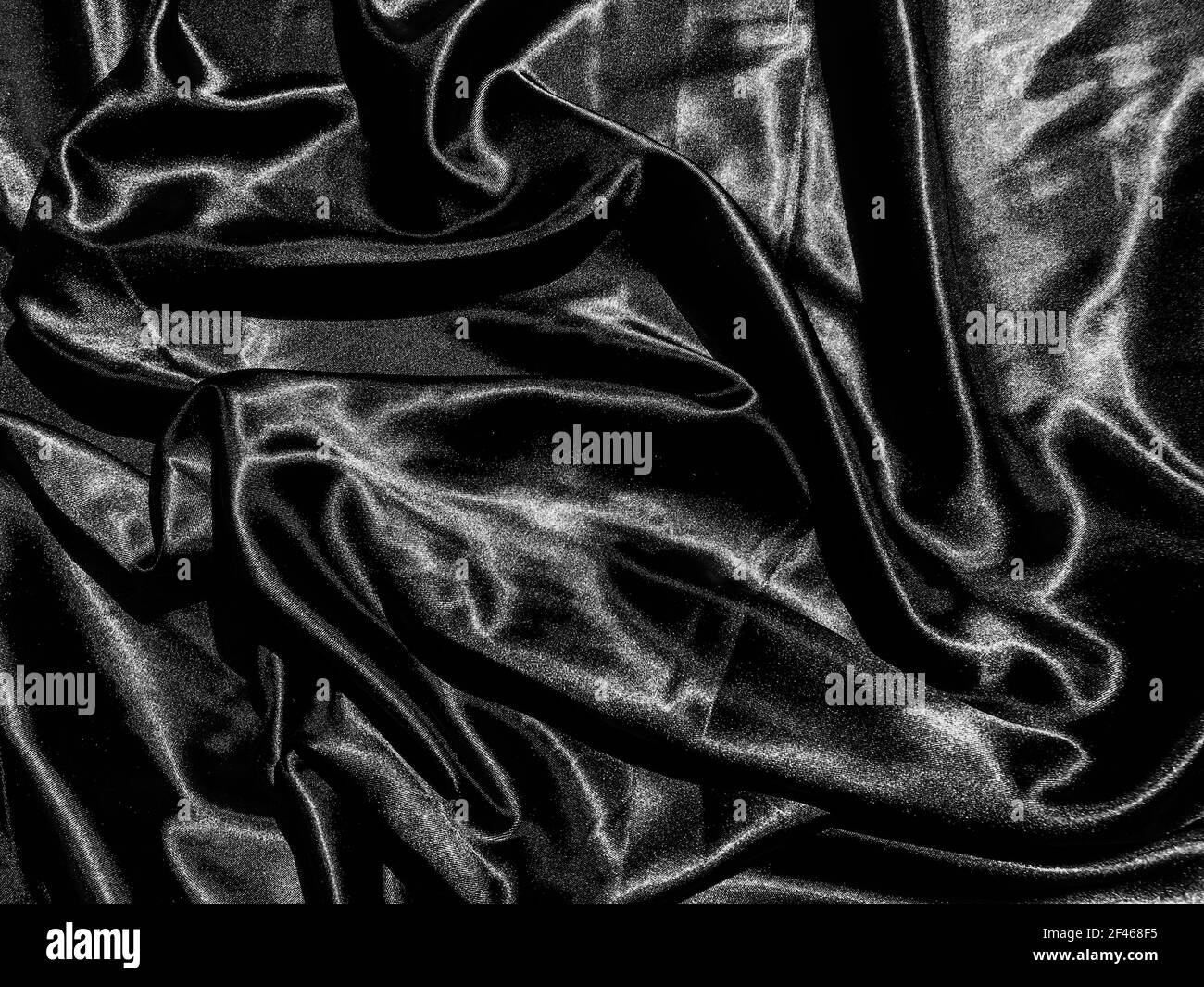 Black satin texture background with liquid wave or wavy folds ...
