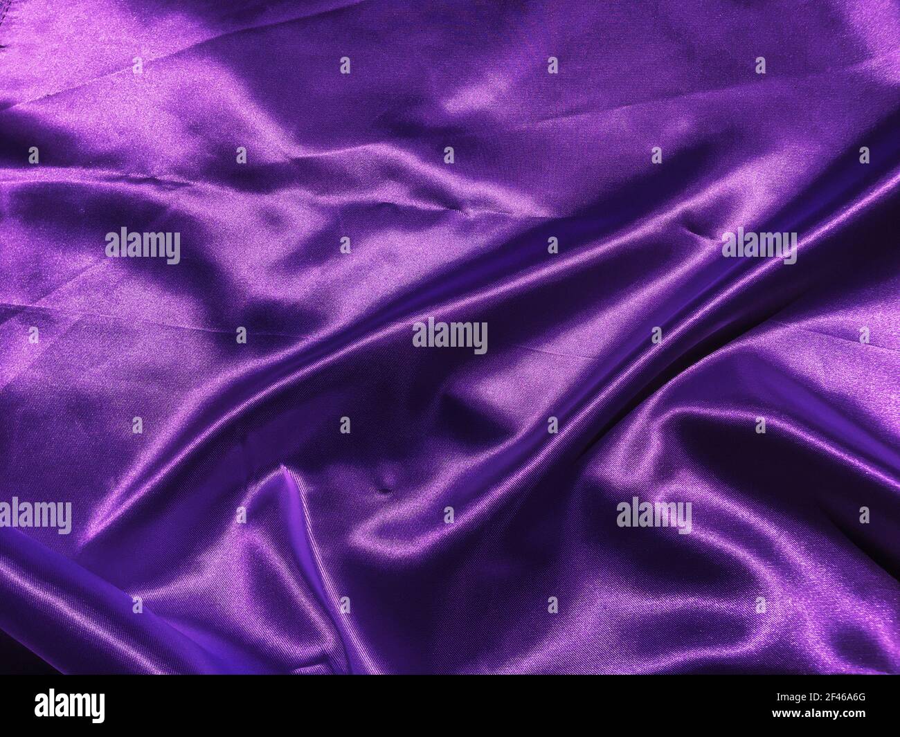 Beautiful smooth purple fabric texture background with copy space for ...