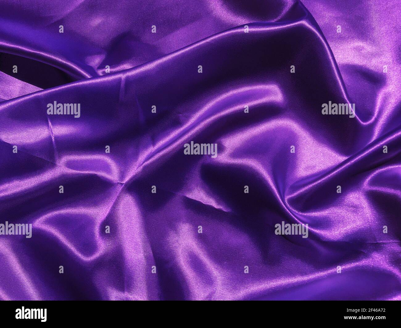 Beautiful smooth purple fabric texture background with copy space for ...