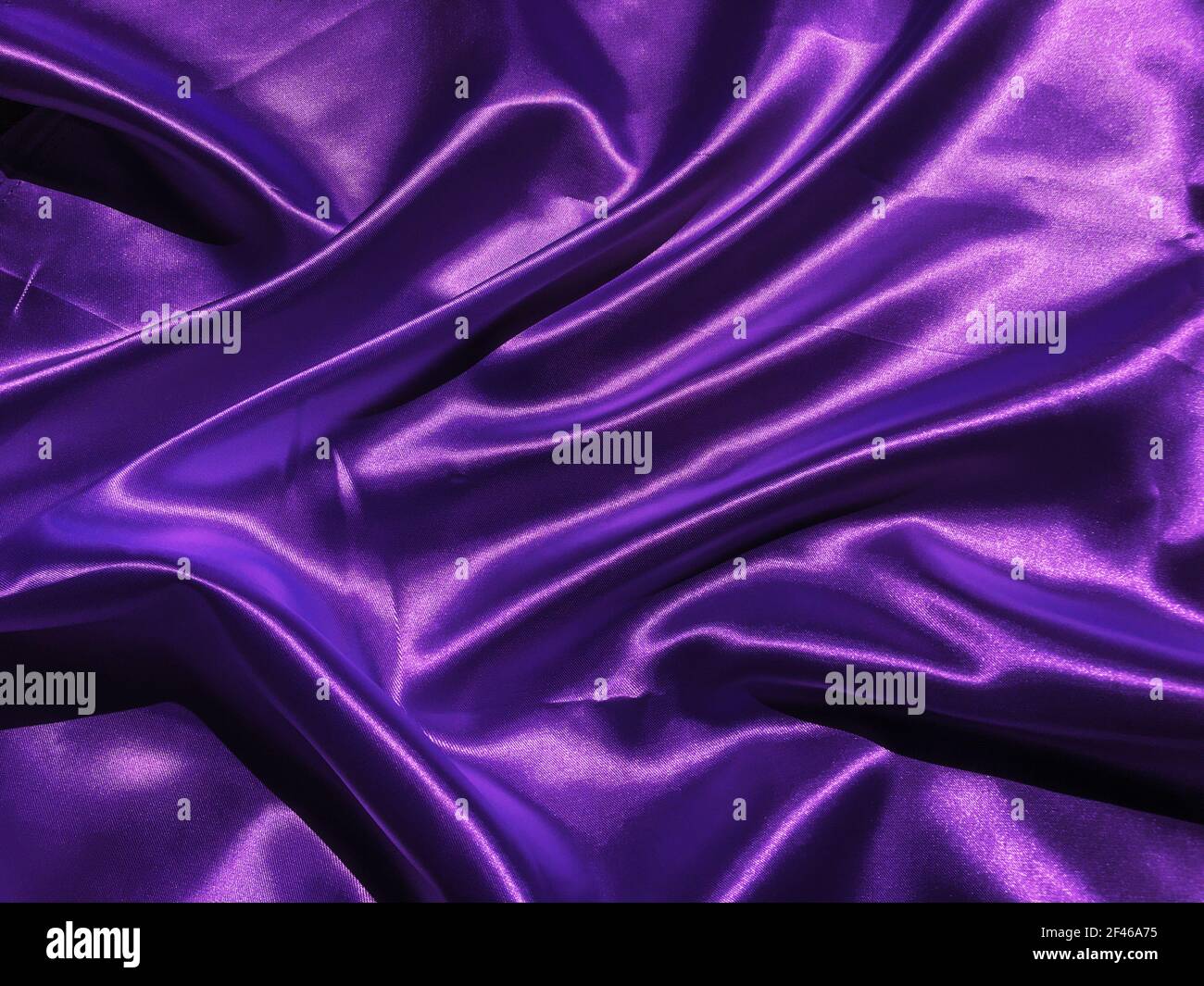 Beautiful smooth purple fabric texture background with copy space for ...