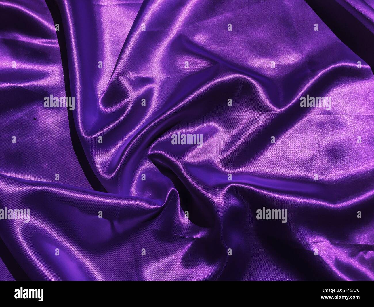 Beautiful smooth purple fabric texture background with copy space for ...