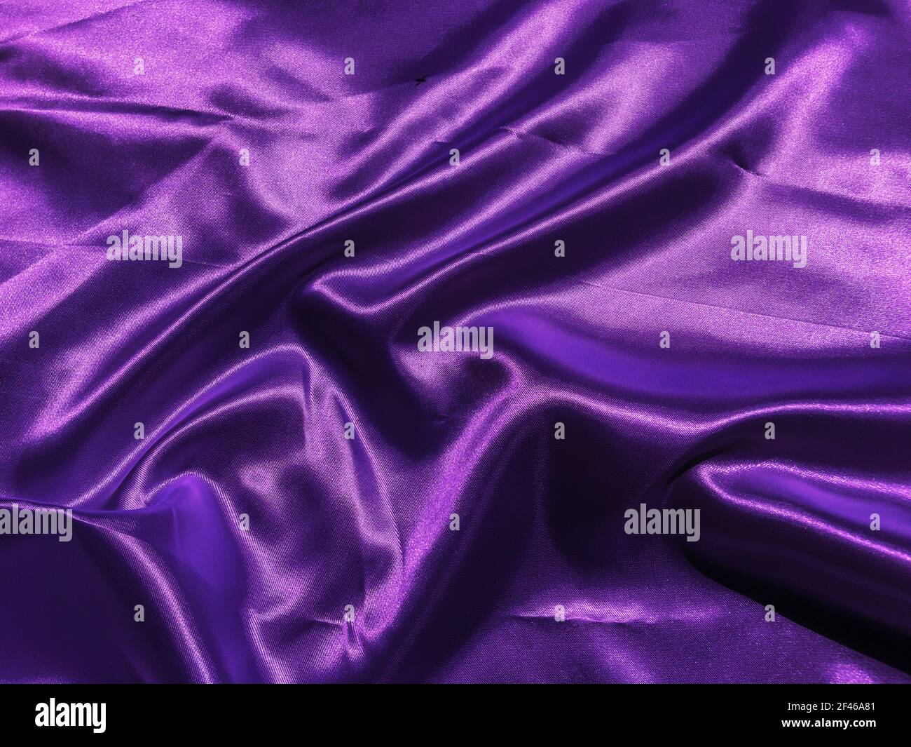 Beautiful smooth purple fabric texture background with copy space for ...