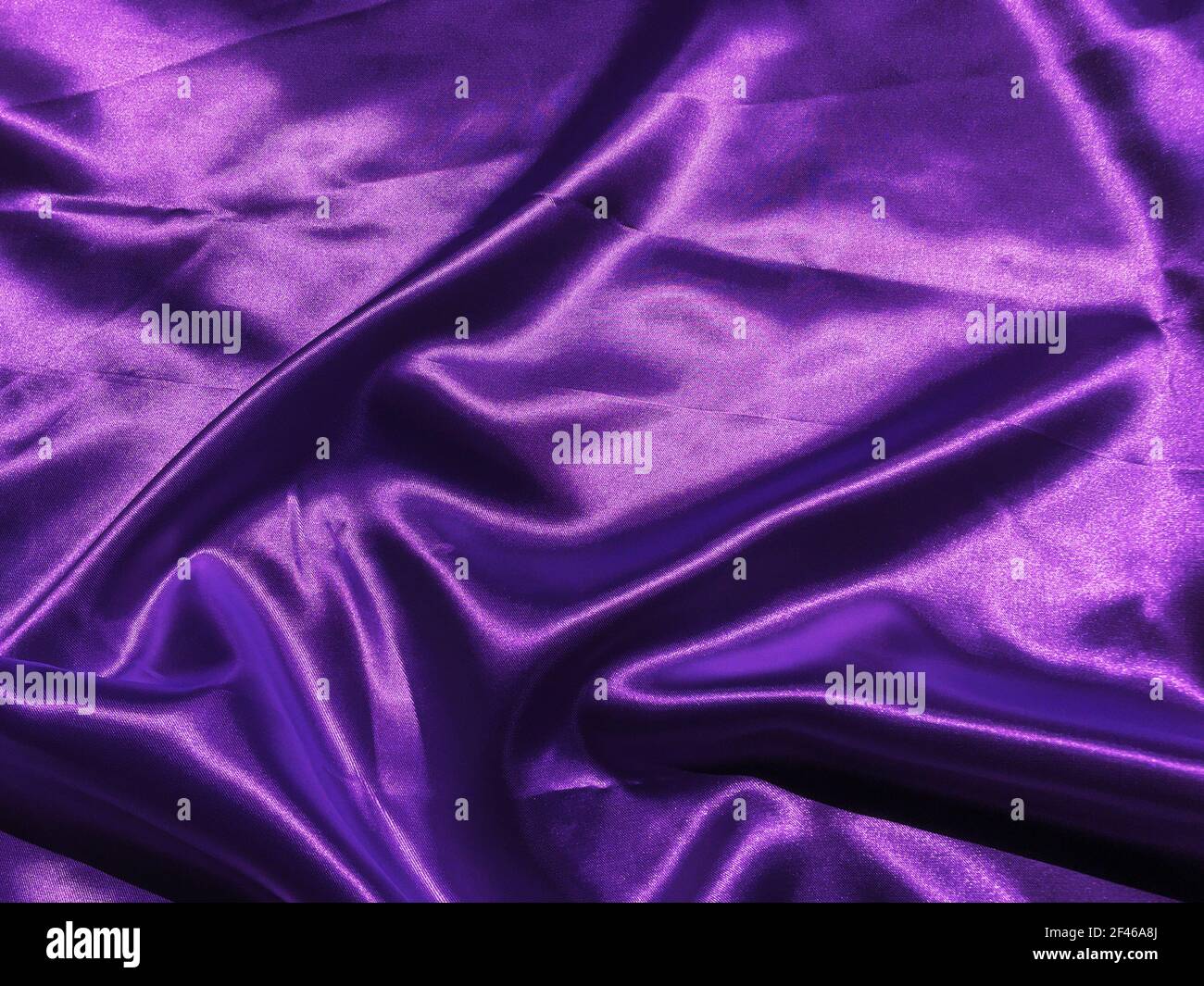 Beautiful smooth purple fabric texture background with copy space for ...